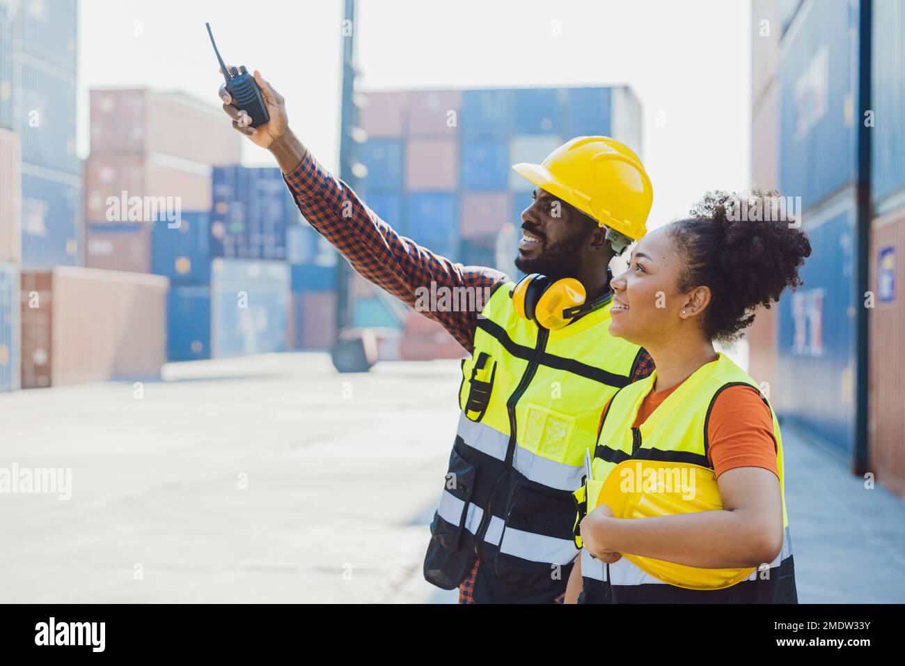 African worker people teamwork happy working together in port cargo ...