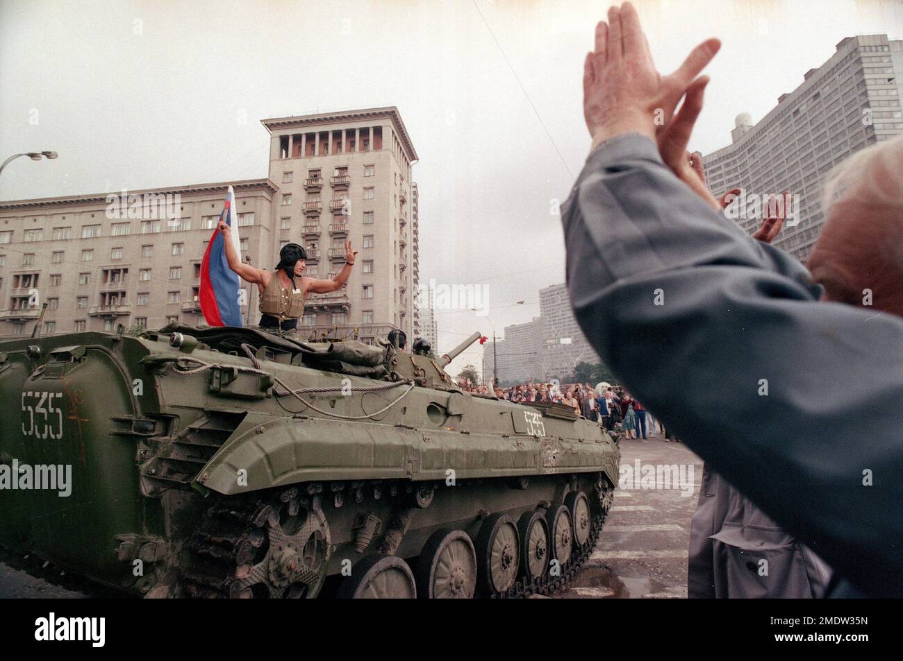 FILE - In this Wednesday, Aug. 21, 1991 file photo, a crowd greet a ...