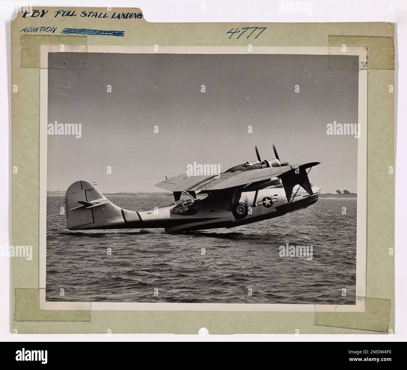 PBY Full Stall Landing. This image depicts a U.S. Coast Guard Station ...
