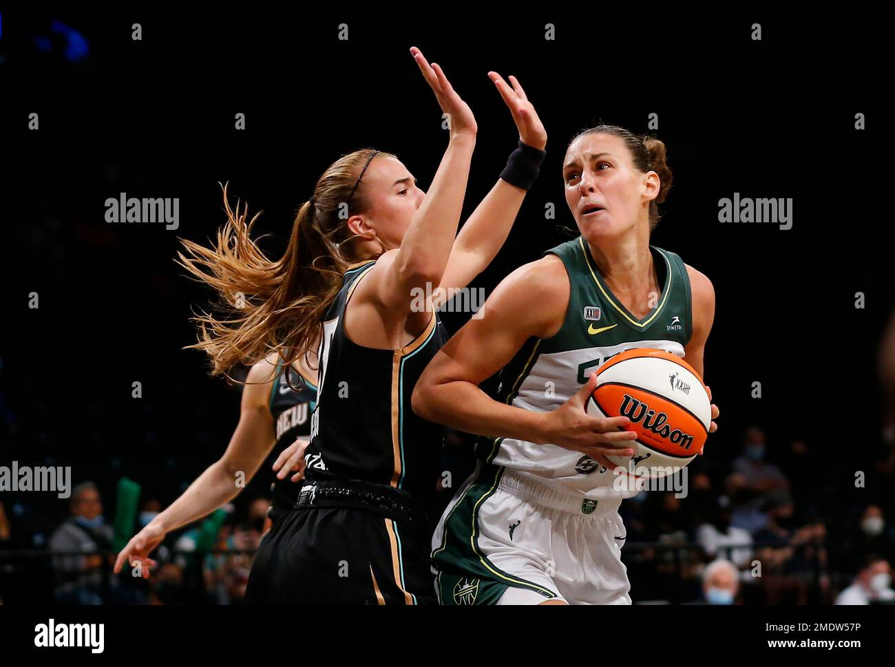 New York Liberty guard Sabrina Ionescu, left, defends against Seattle ...
