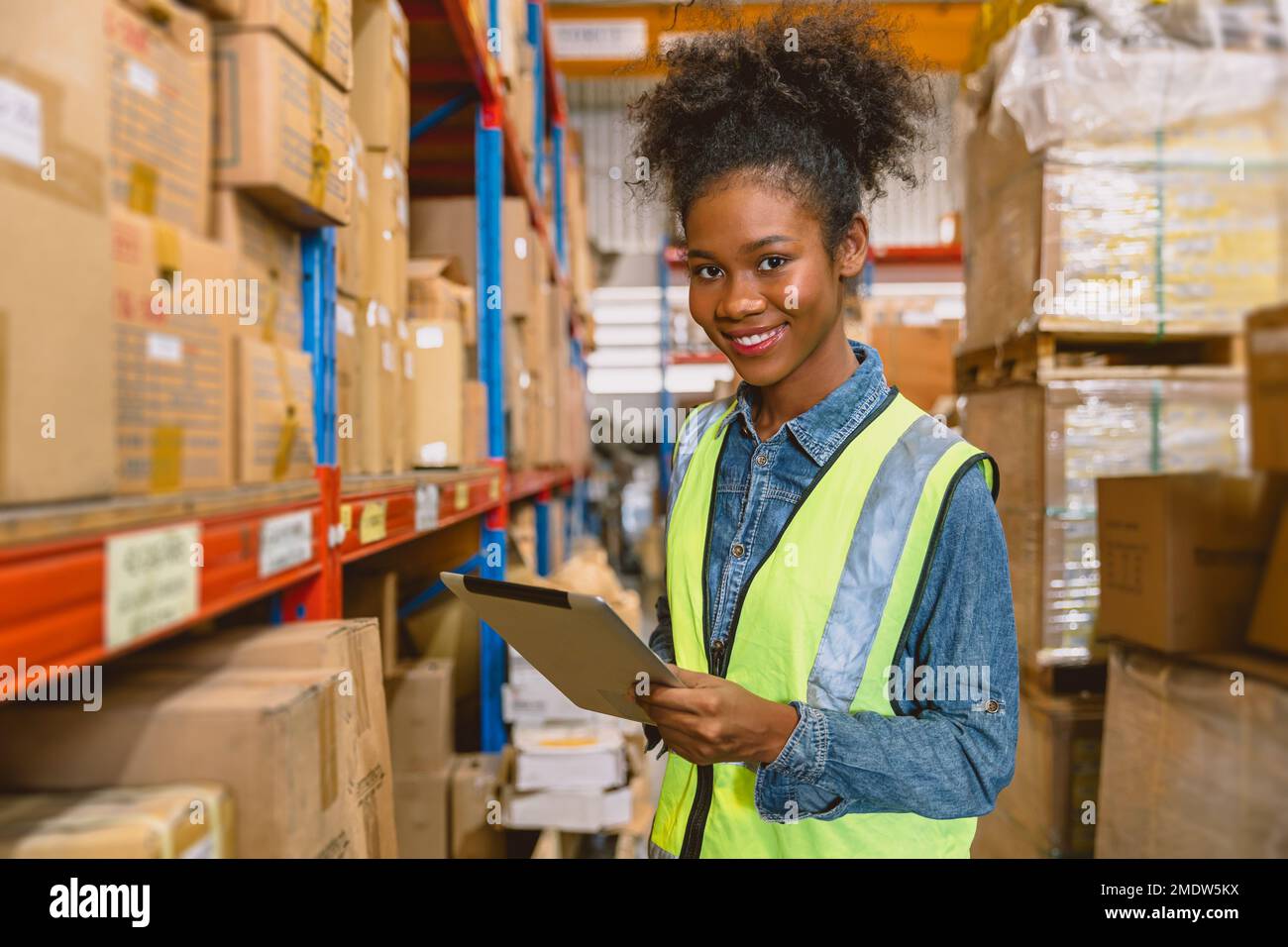 woman worker black African girl teen working in cargo warehouse inventory employee staff ...