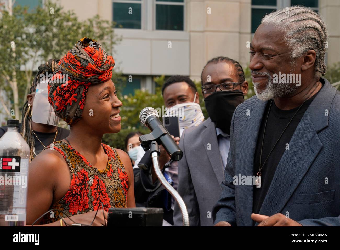 Nakia Porter and her father Joe Powell, right, exchanged smiles during ...