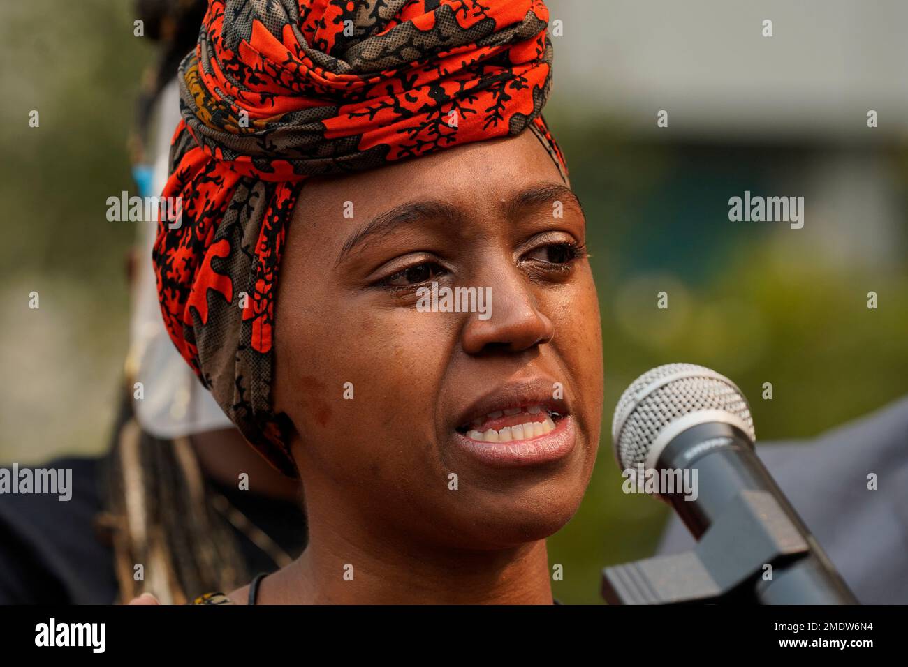 Nakia Porter speaks during a news conference to announce the filing of ...