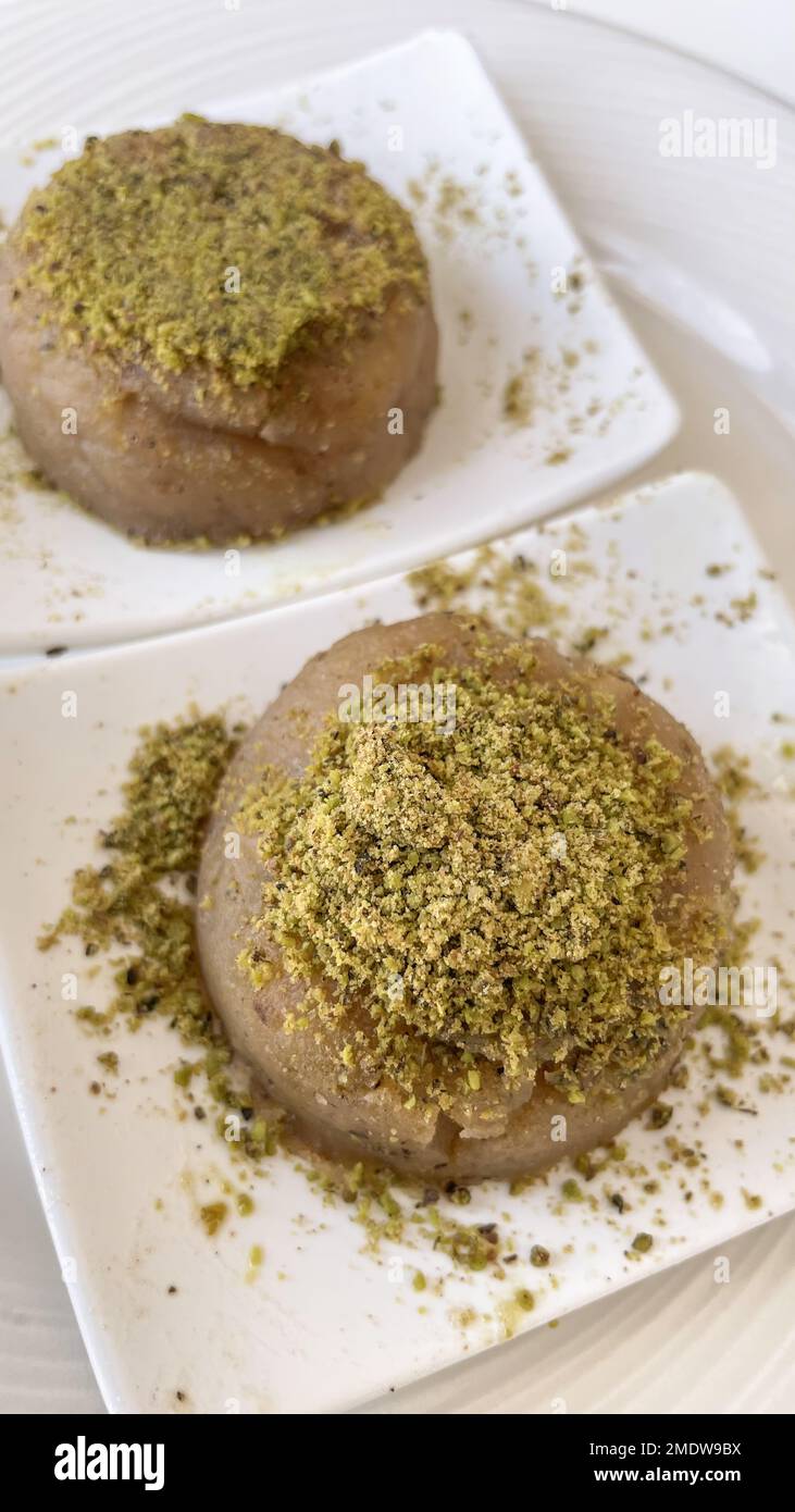 A vertical shot of traditional Turkish halvas with pistachios Stock ...
