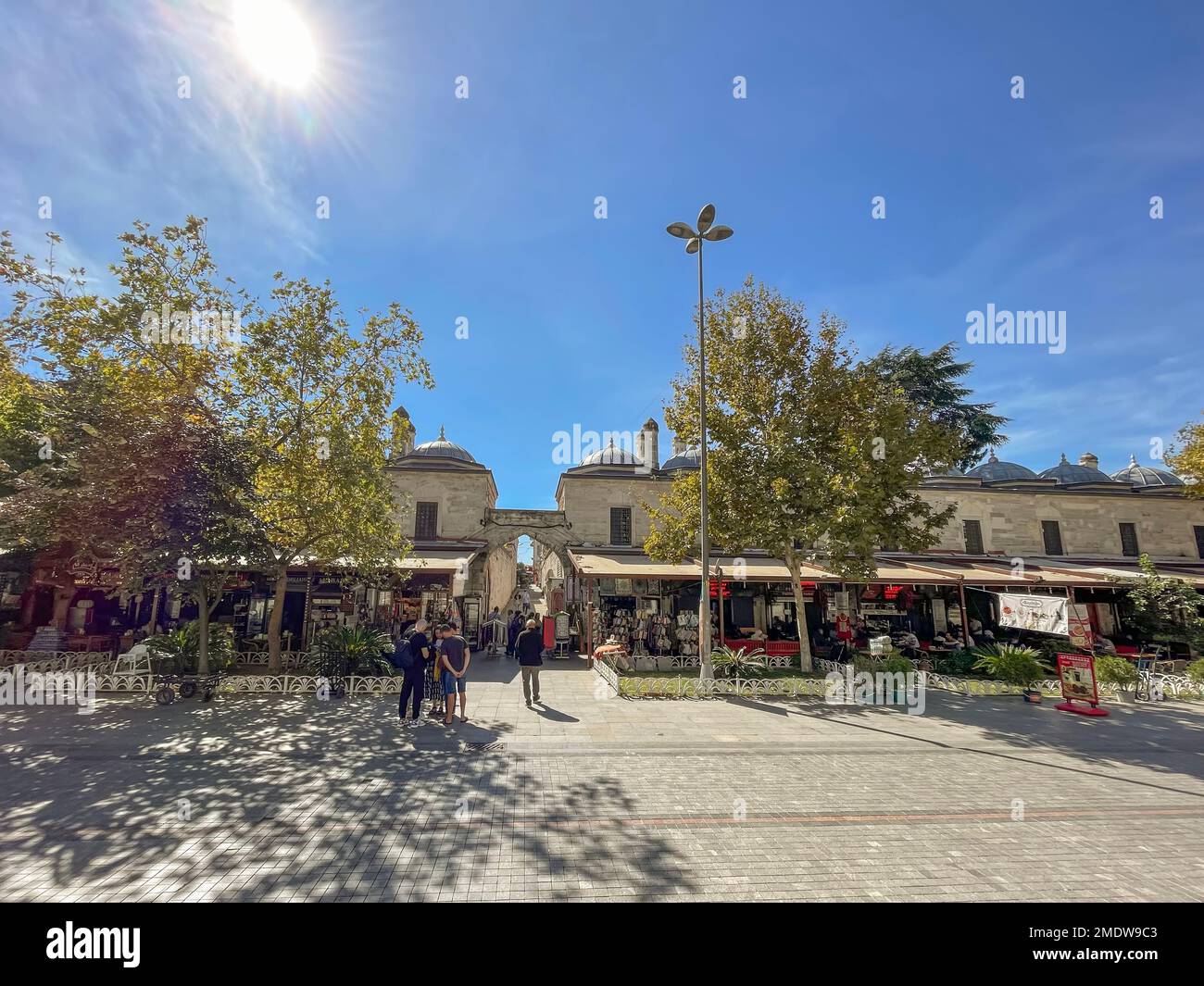 A closeup shot of people walking near the old buildings in Istanbul ...