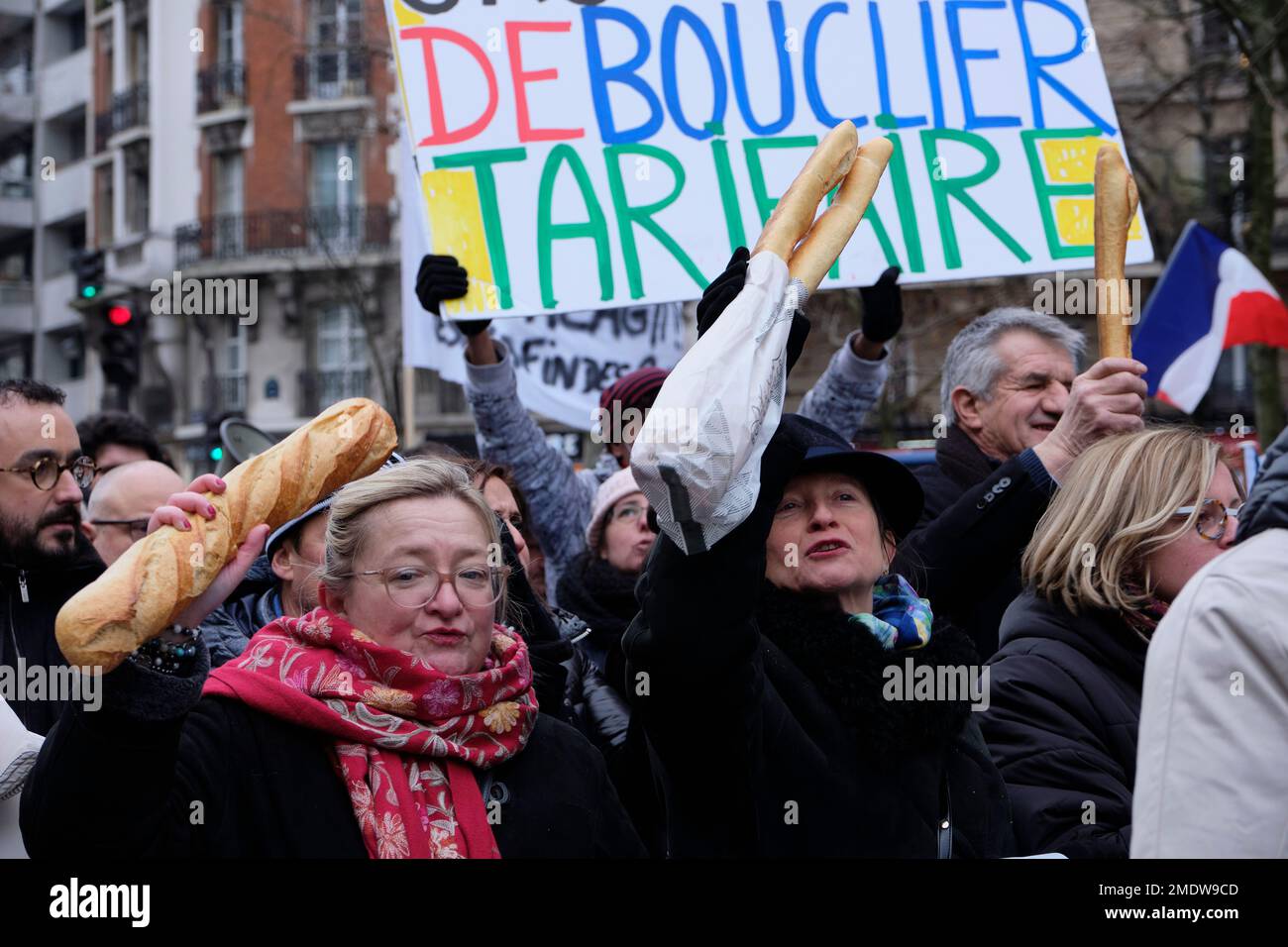 Paris, Ile de France, FRANCE. 23rd Jan, 2023. A woman holds a bread in ...