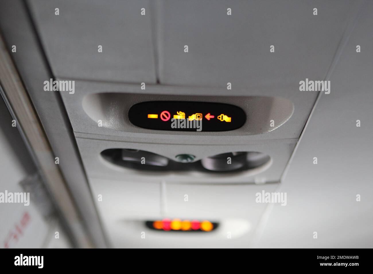 Overhead compartment hi-res stock photography and images - Alamy