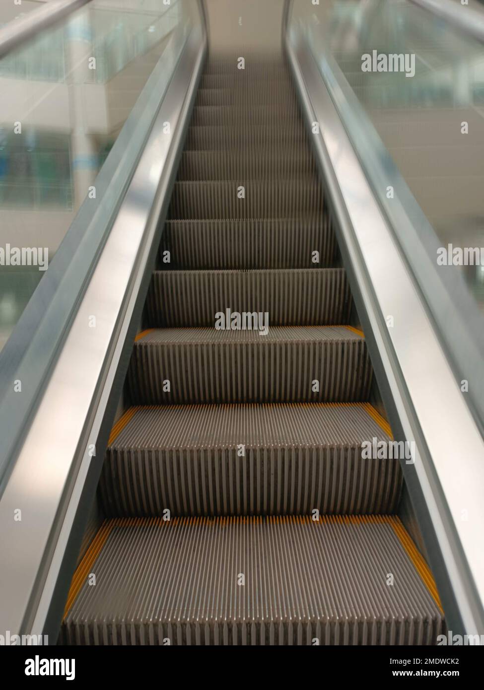 A vertical shot of the empty escalator Stock Photo - Alamy