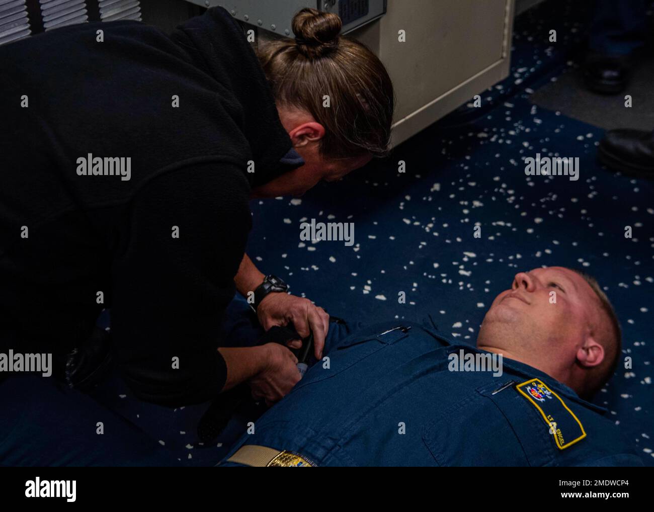 PACIFIC OCEAN (July 25, 2022) Cmdr. Katie Whitman, left, executive ...