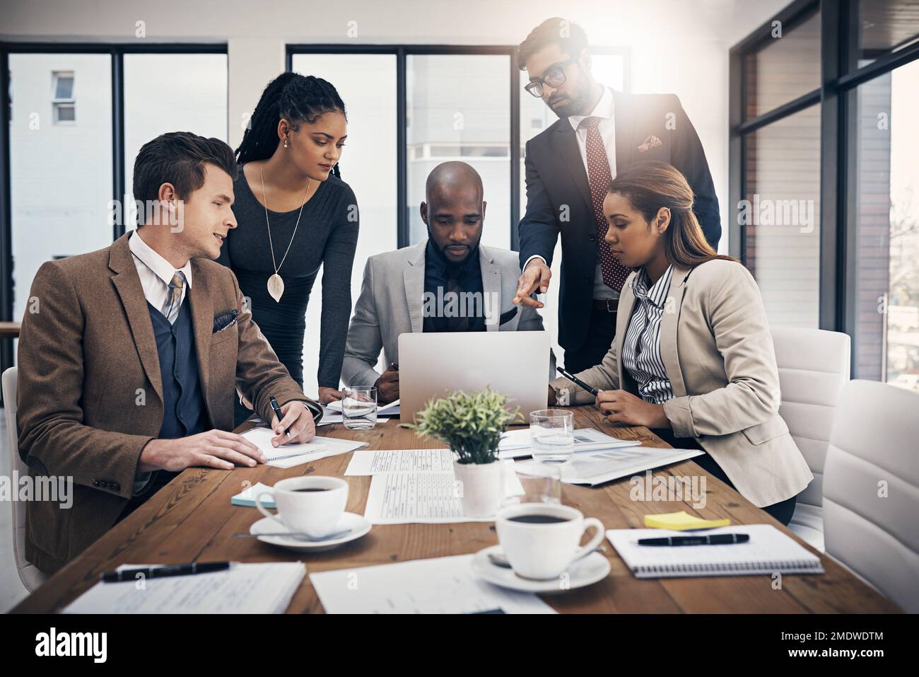 Online resources keep their meetings productive. a group of young ...