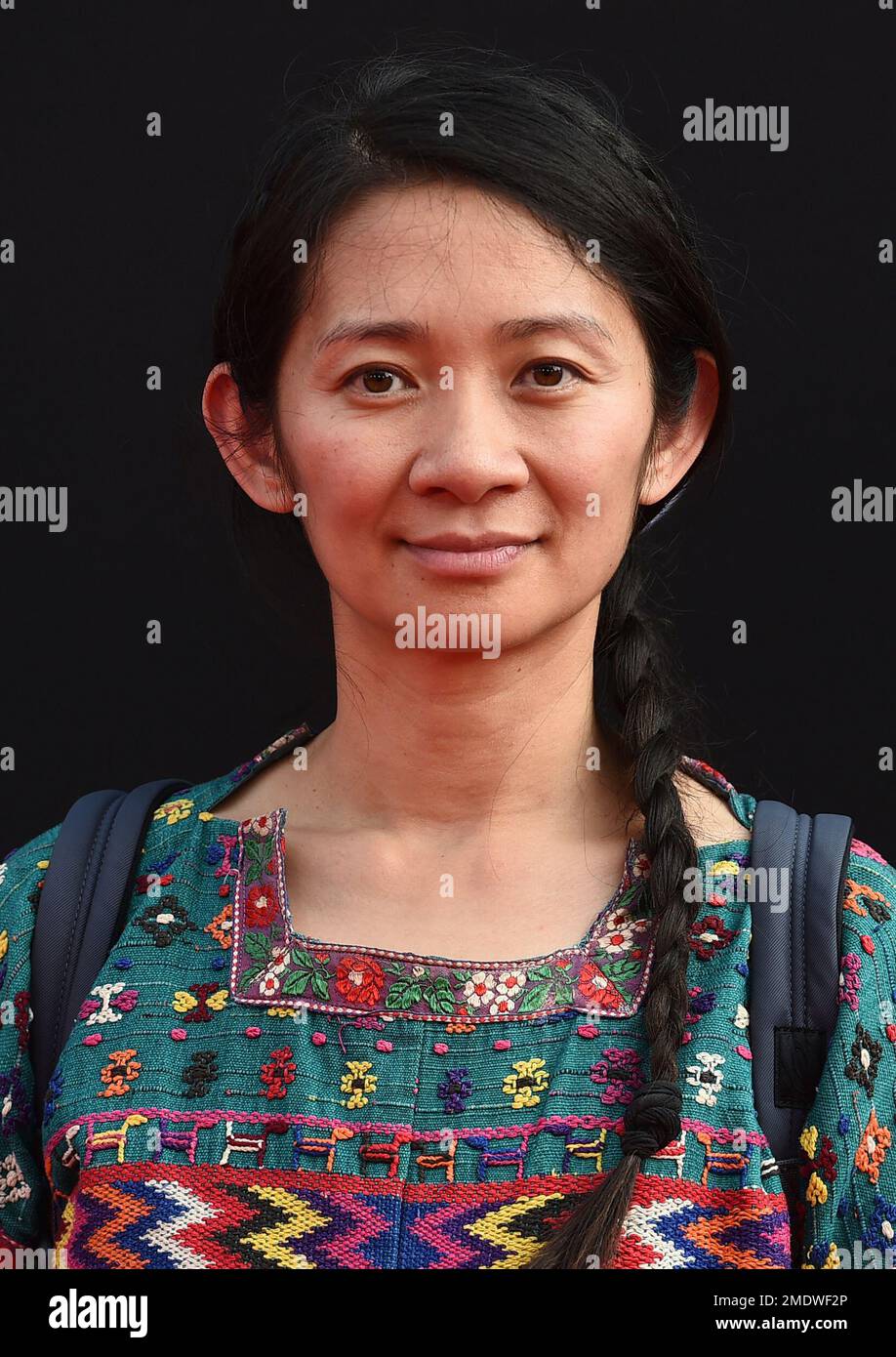 Chloe Zhao arrives at the premiere of "Shang-Chi and the Legend of the ...