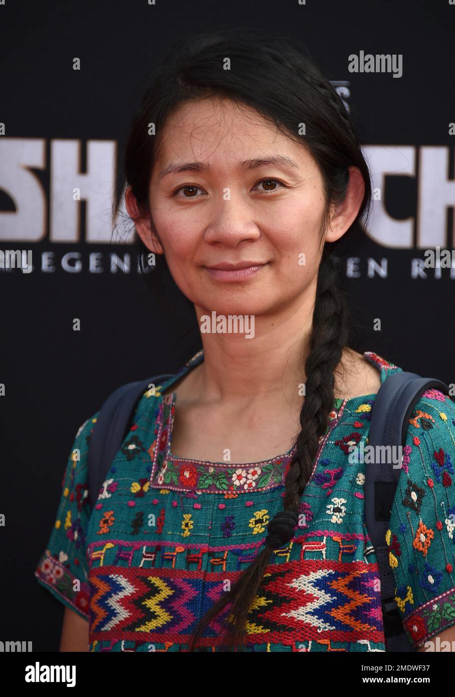 Chloe Zhao arrives at the premiere of "Shang-Chi and the Legend of the ...