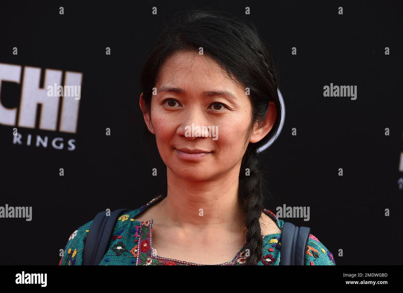 Chloe Zhao arrives at the premiere of "Shang-Chi and the Legend of the ...