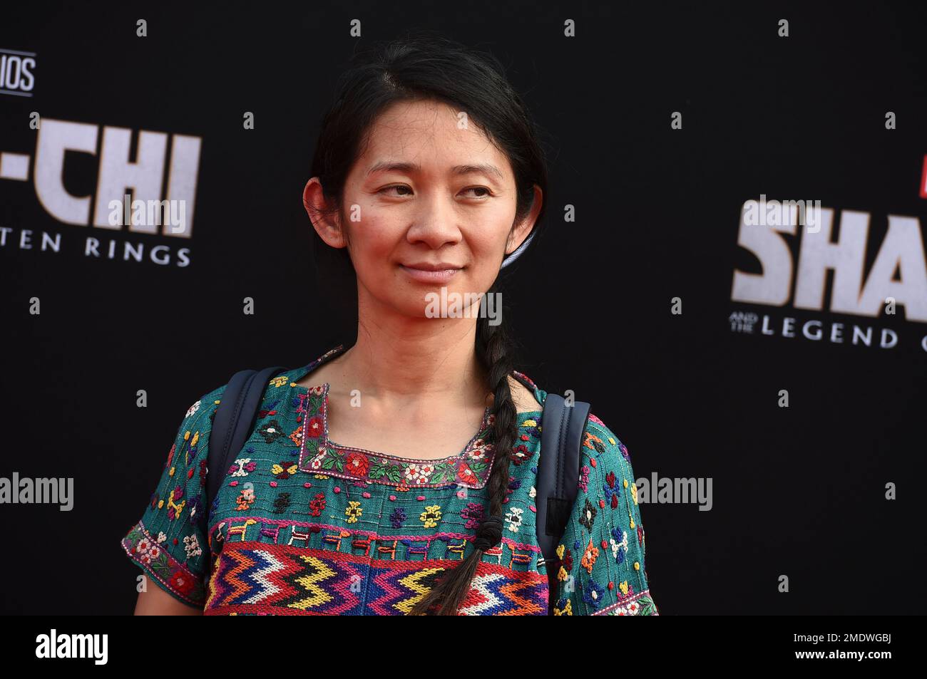 Chloe Zhao arrives at the premiere of "Shang-Chi and the Legend of the ...