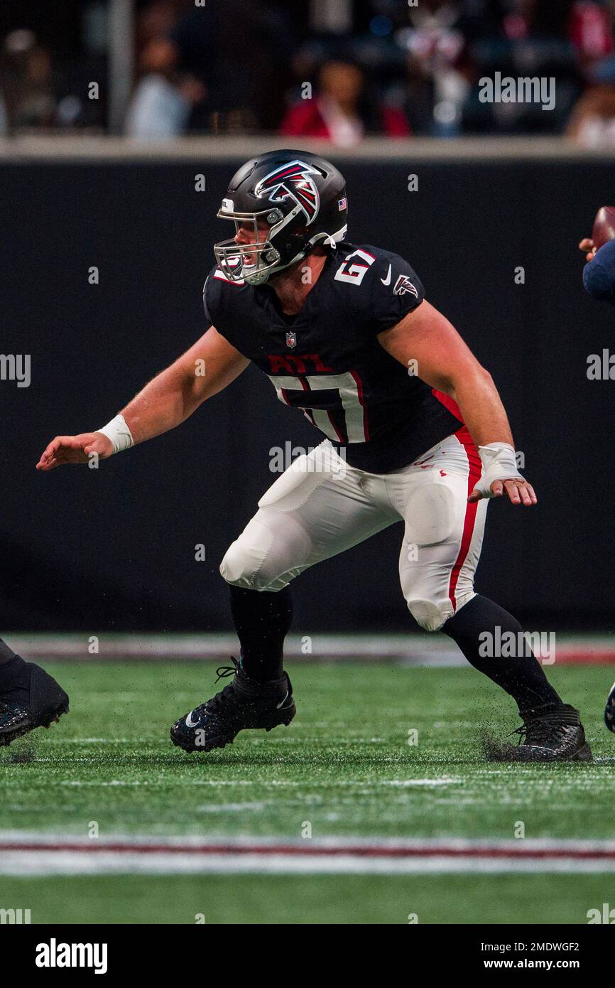 Atlanta Falcons center Drew Dalman (67) works during the first half of ...