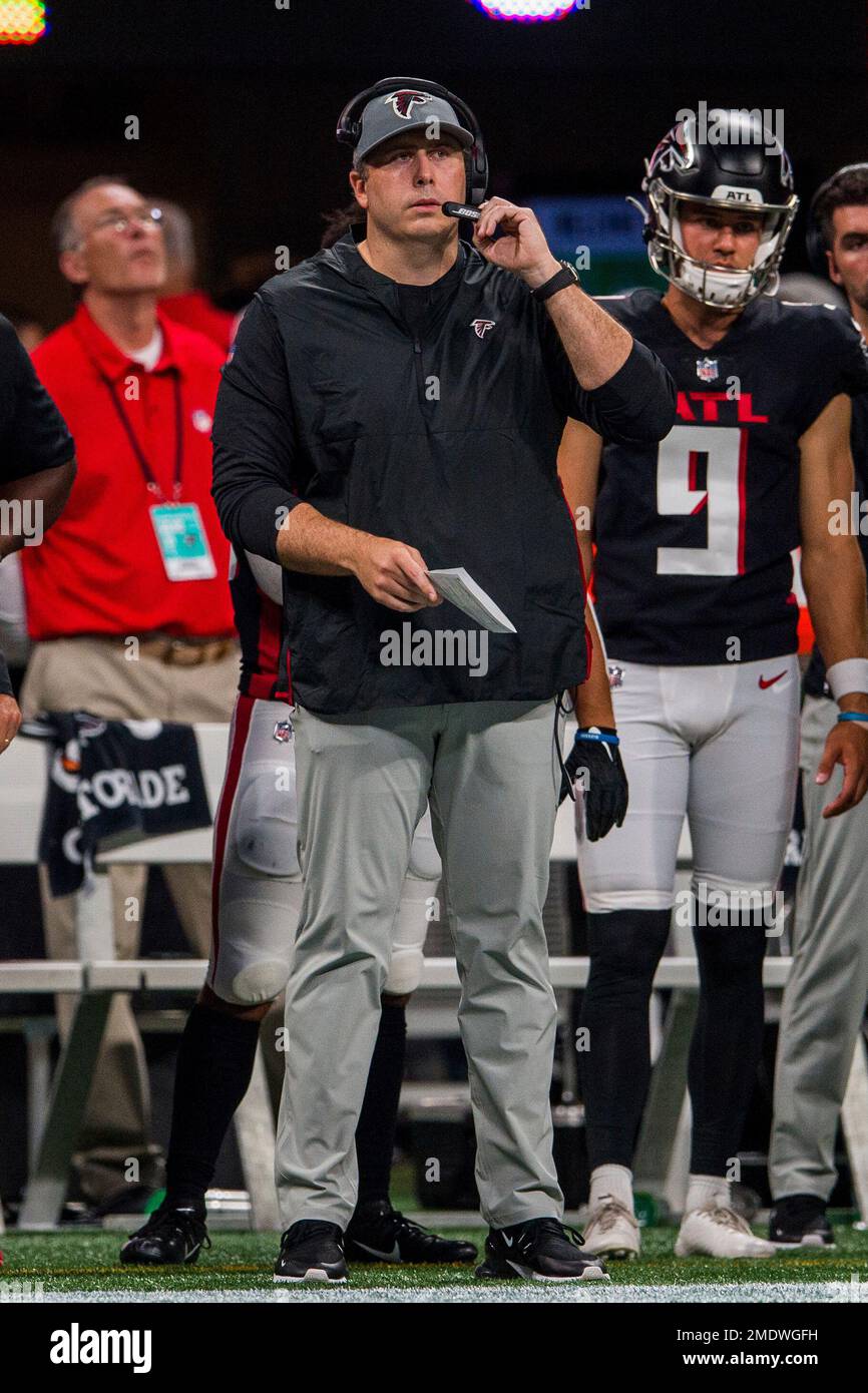 Atlanta Falcons head coach Arthur Smith works during the first half of ...