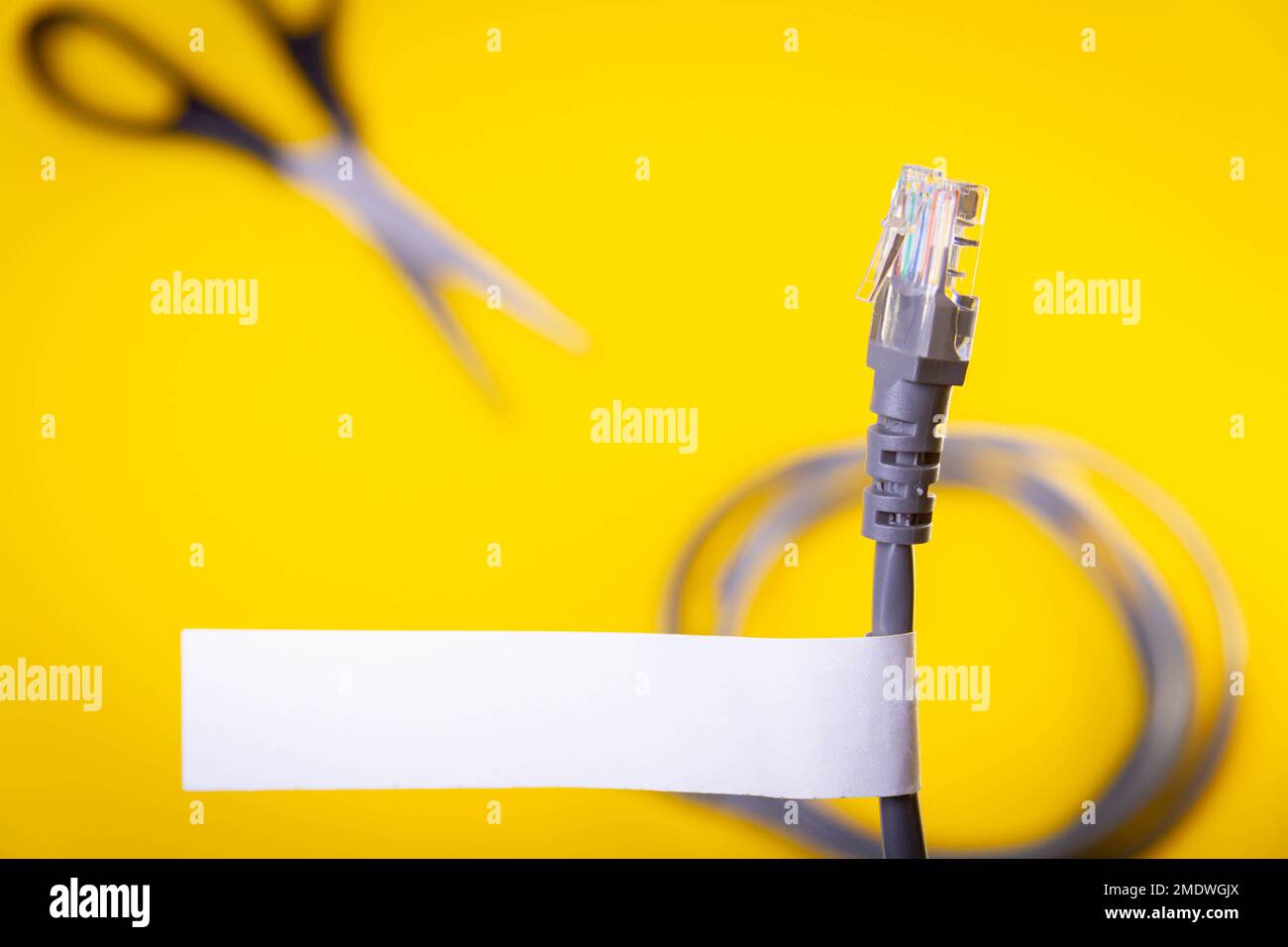 Internet cable and scissors cut it. Disconnection of Internet network ...