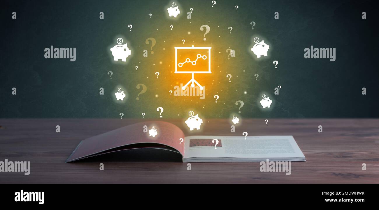 Open book with business icons above Stock Photo - Alamy