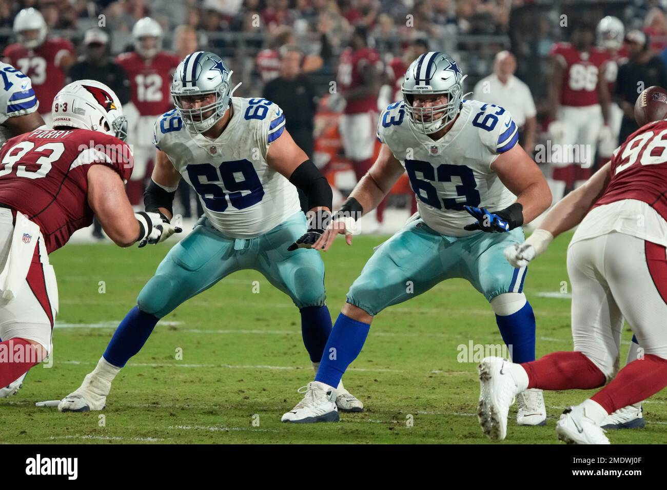 Dallas Cowboys offensive tackle Brandon Knight (69) and center Tyler ...