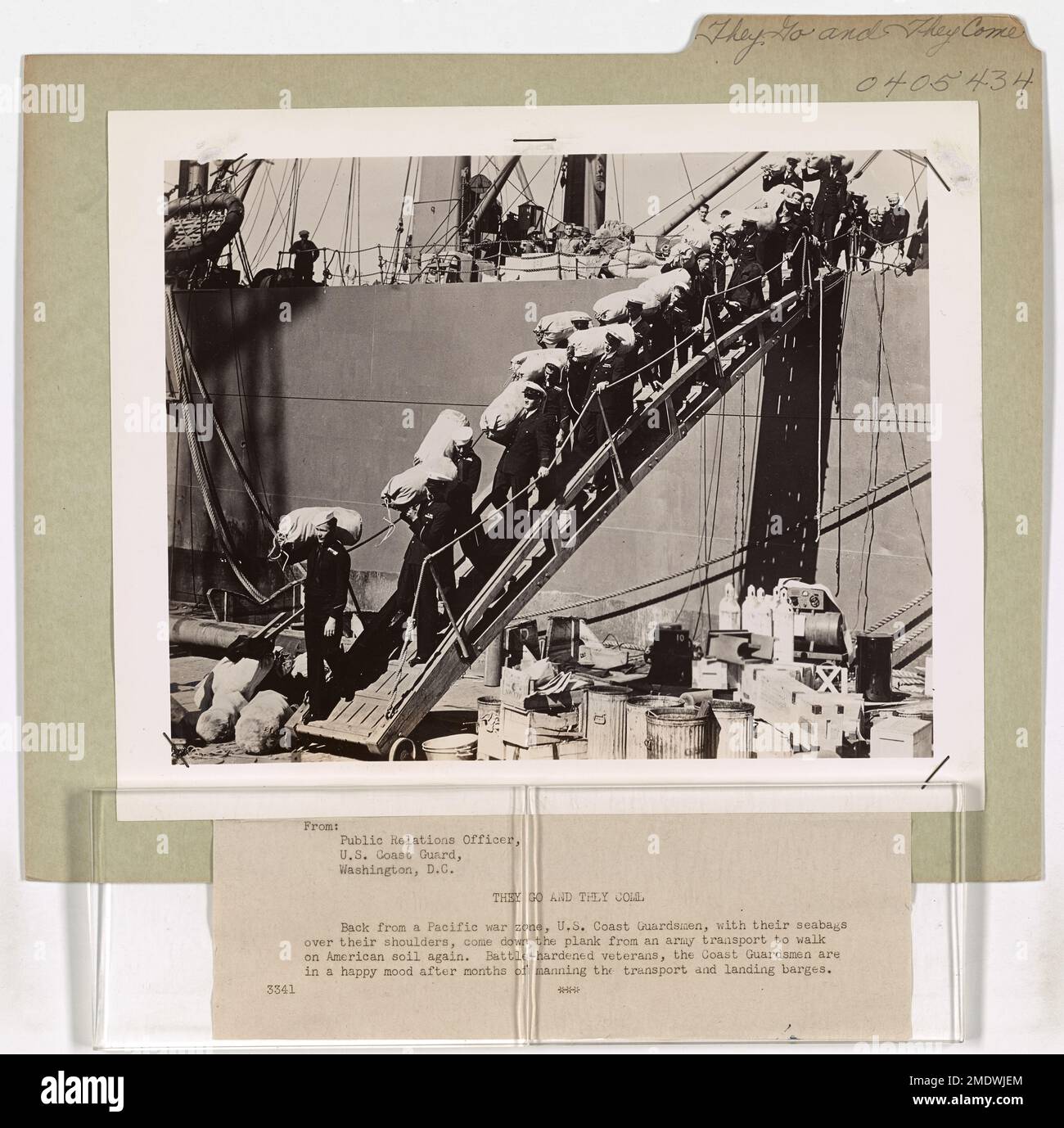 U.S. Coast Guardsmen are pictured disembarking from an Army transport ...