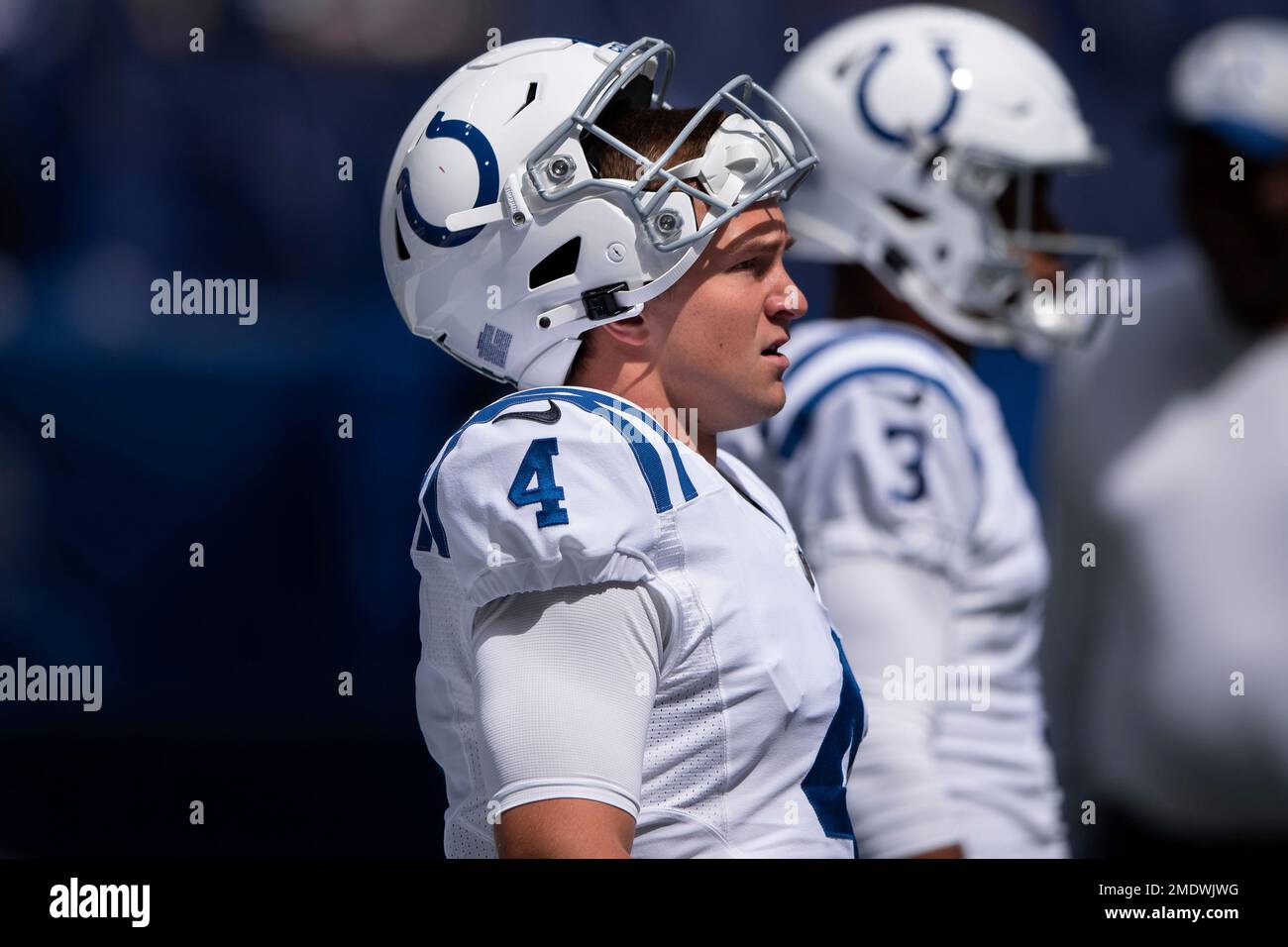 Indianapolis Colts quarterback Sam Ehlinger (4) warms up on the field ...