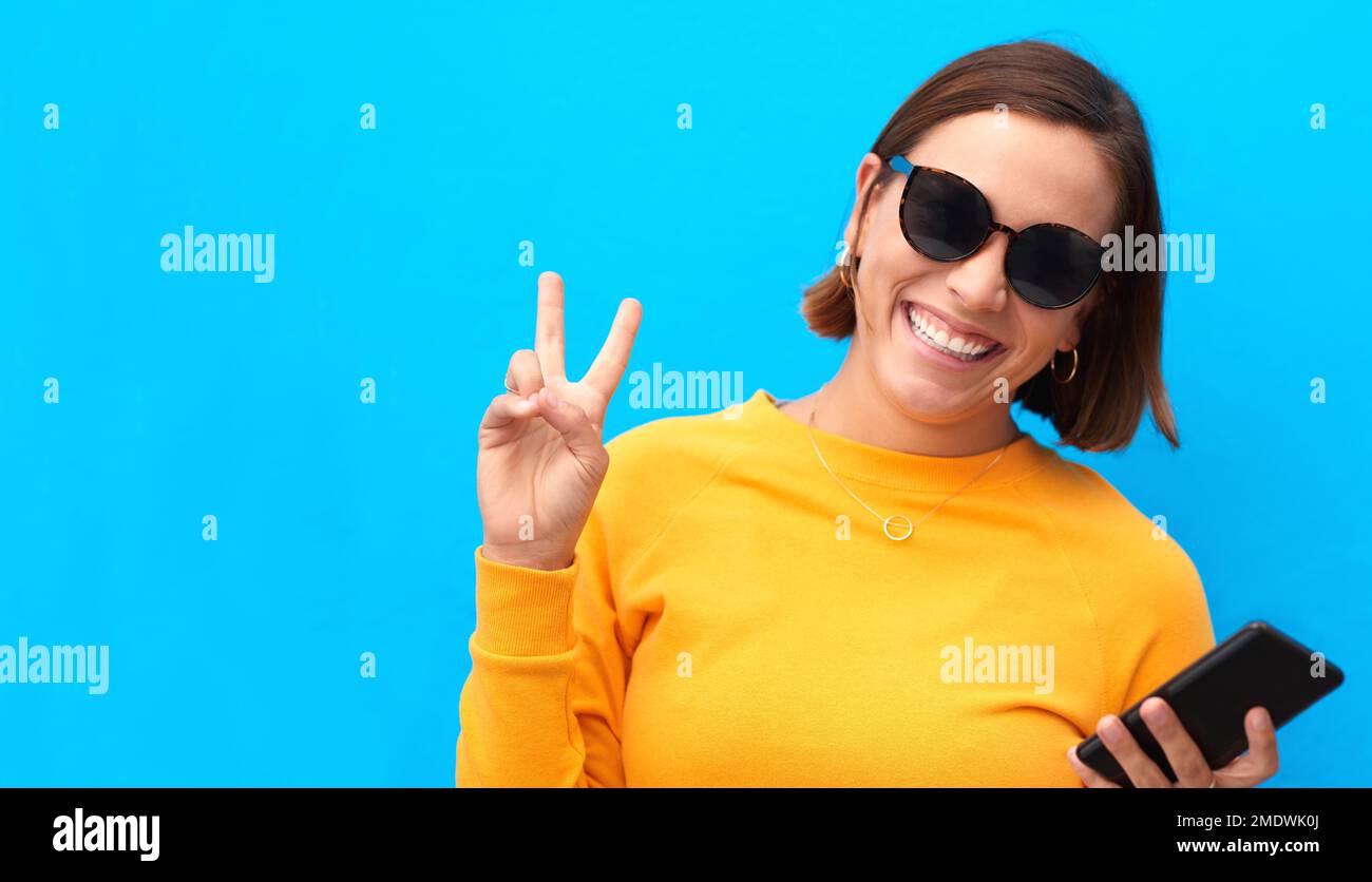 Im all about peace and optimism. Cropped portrait of a happy young ...