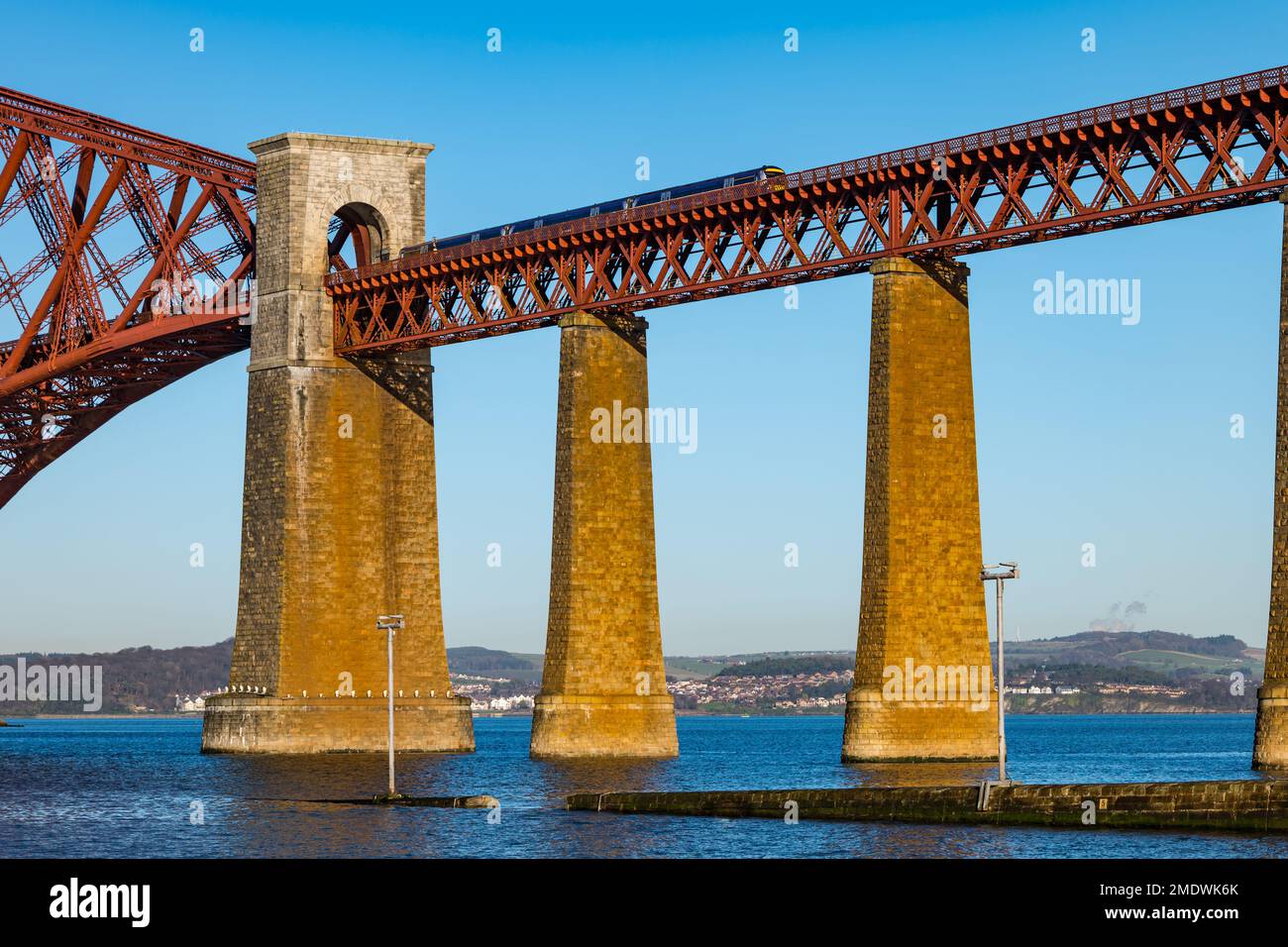 Scotrail local train crossing Victorian cantilever Forth Rail bridge on ...