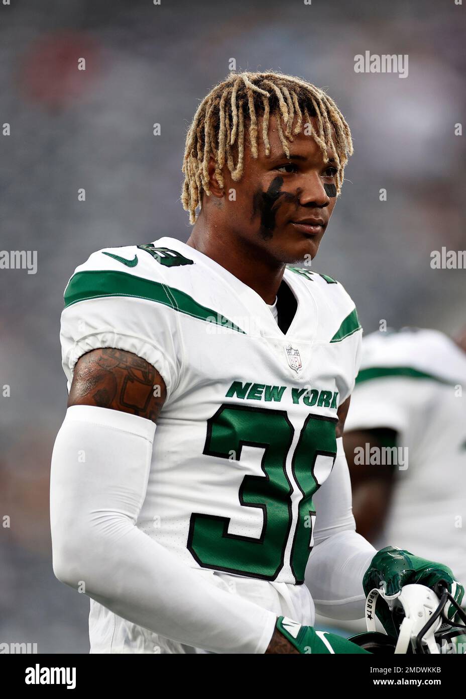 New York Jets cornerback Lamar Jackson (38) warms up before taking on ...