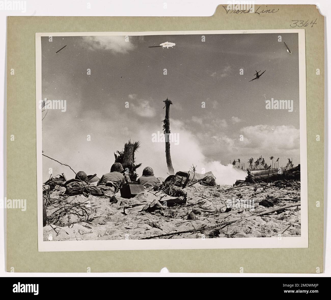 A Coast Guard combat photographer captures a sharp action moment during ...