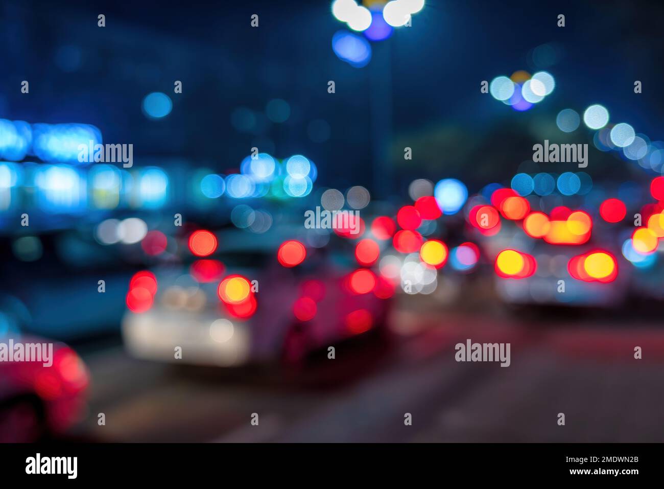 Blurred car traffic lights at night city. Traffic jam in evening rush ...