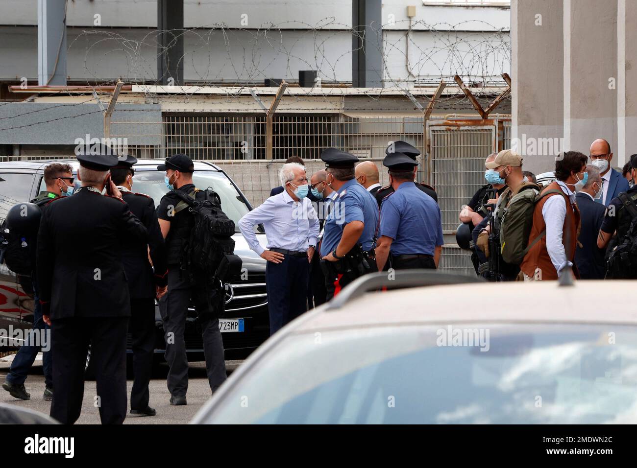Italian ambassador to Afghanistan Vittorio Sandalli, center, is seen ...