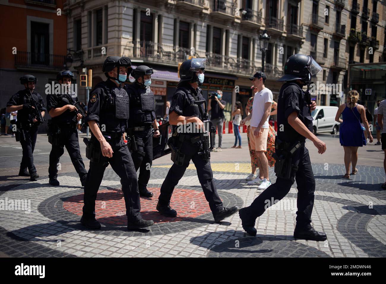 Armed police walk near a hotel after an explosion was heard there in ...