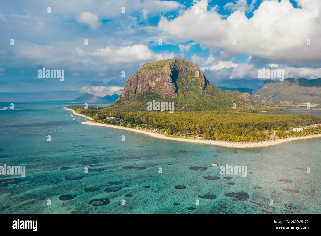 Turquoise lagoon protected with coral reefs on Le Morne peninsula with ...