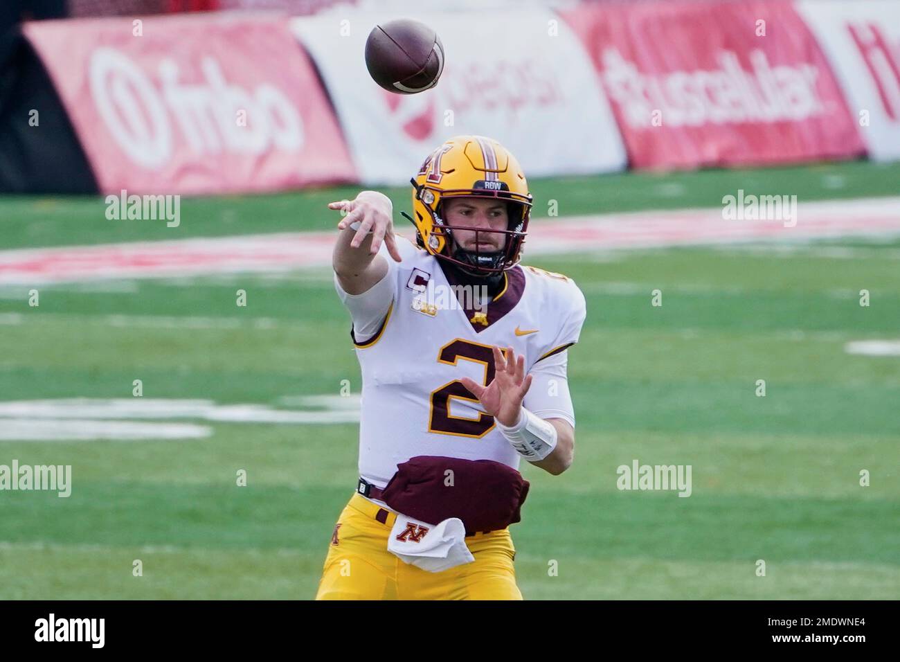 FILE - Minnesota quarterback Tanner Morgan (2) throws during the first ...