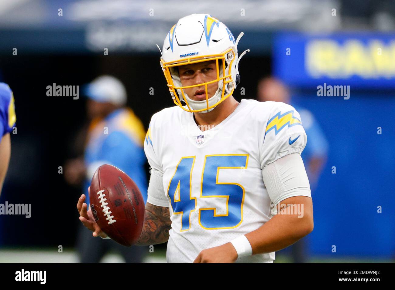 Los Angeles Chargers long snapper Cole Mazza (45) warms up before a ...