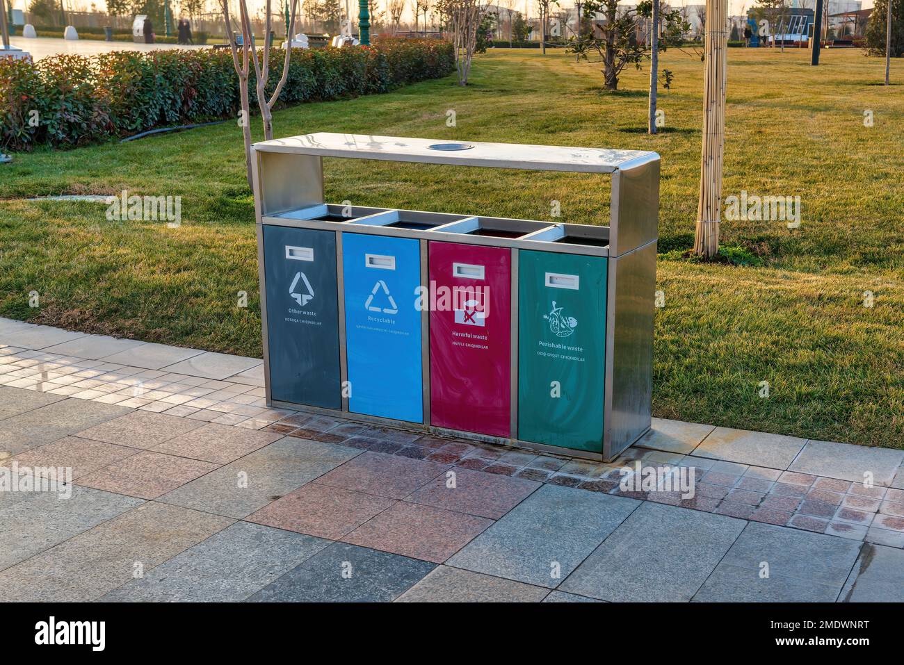 Iron multi-colored containers for separate waste collection. Waste ...