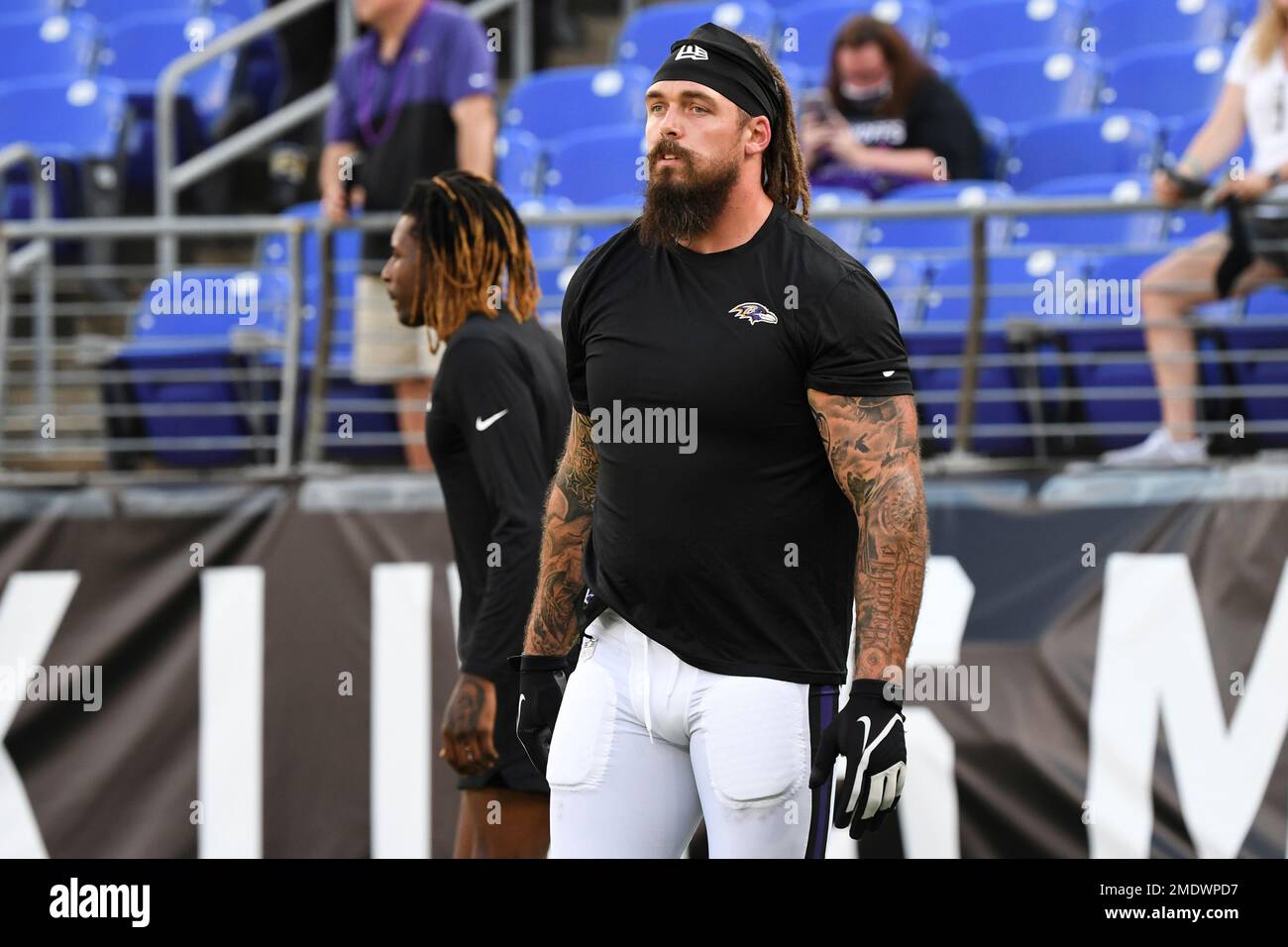 Baltimore Ravens defensive end Derek Wolfe looks on during pre-game ...