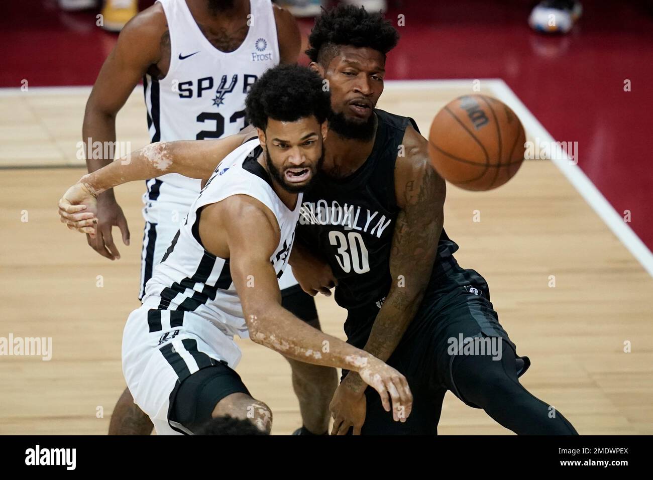 Brooklyn Nets' Chris Silva, right, blocks a shot attempt by San Antonio ...