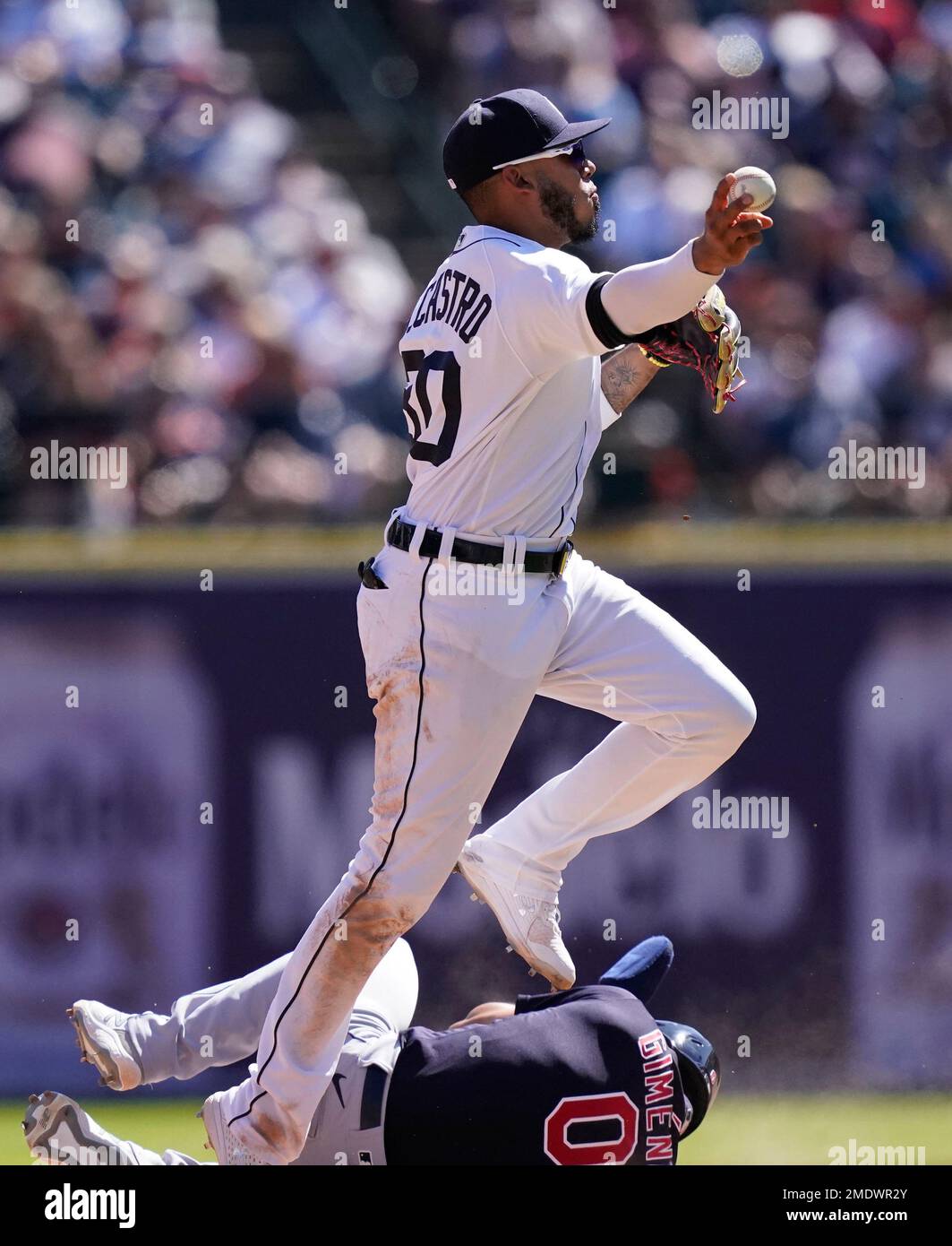 Detroit Tigers short stop Harold Castro (30) throws to first to ...