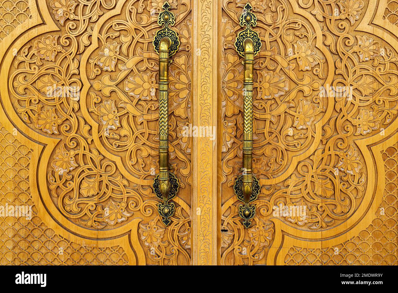 Carved antique wooden doors with patterns and mosaics Stock Photo - Alamy