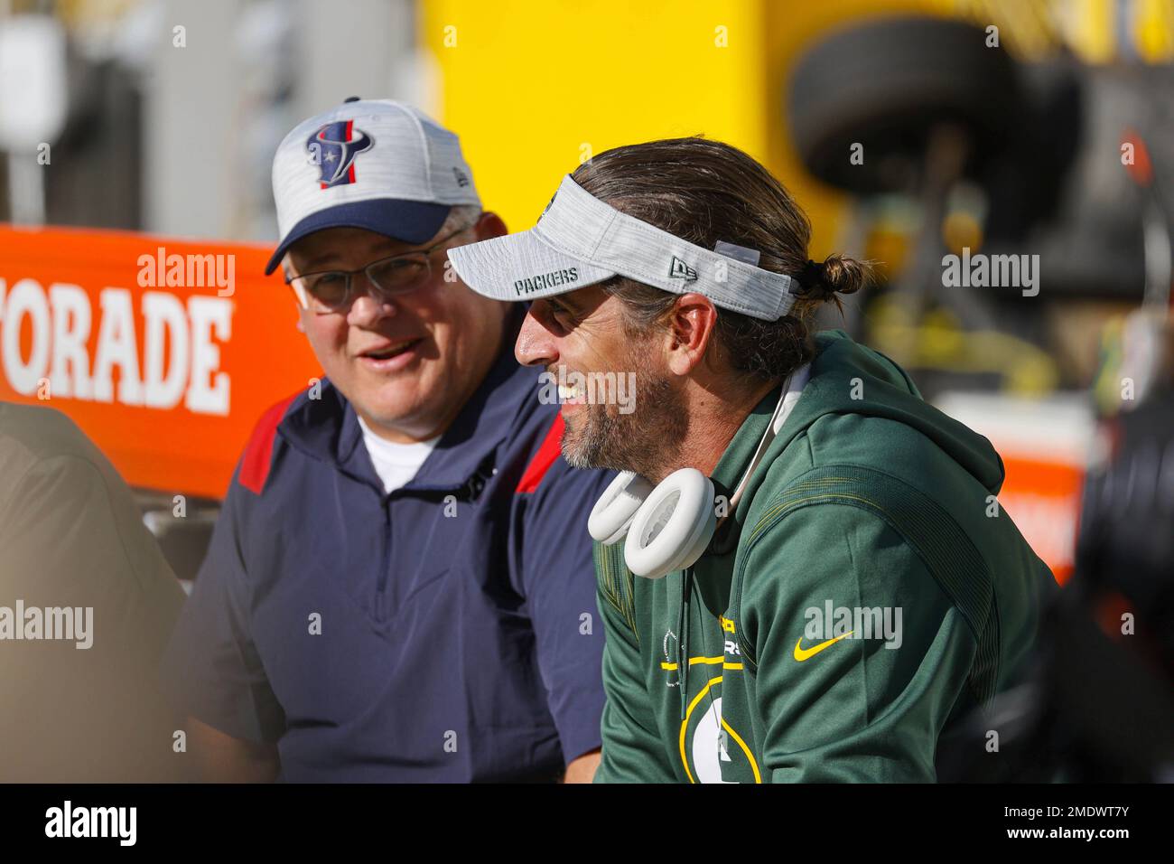 Green Bay quarterback Aaron Rodgers talks with Houston Texans offensive ...