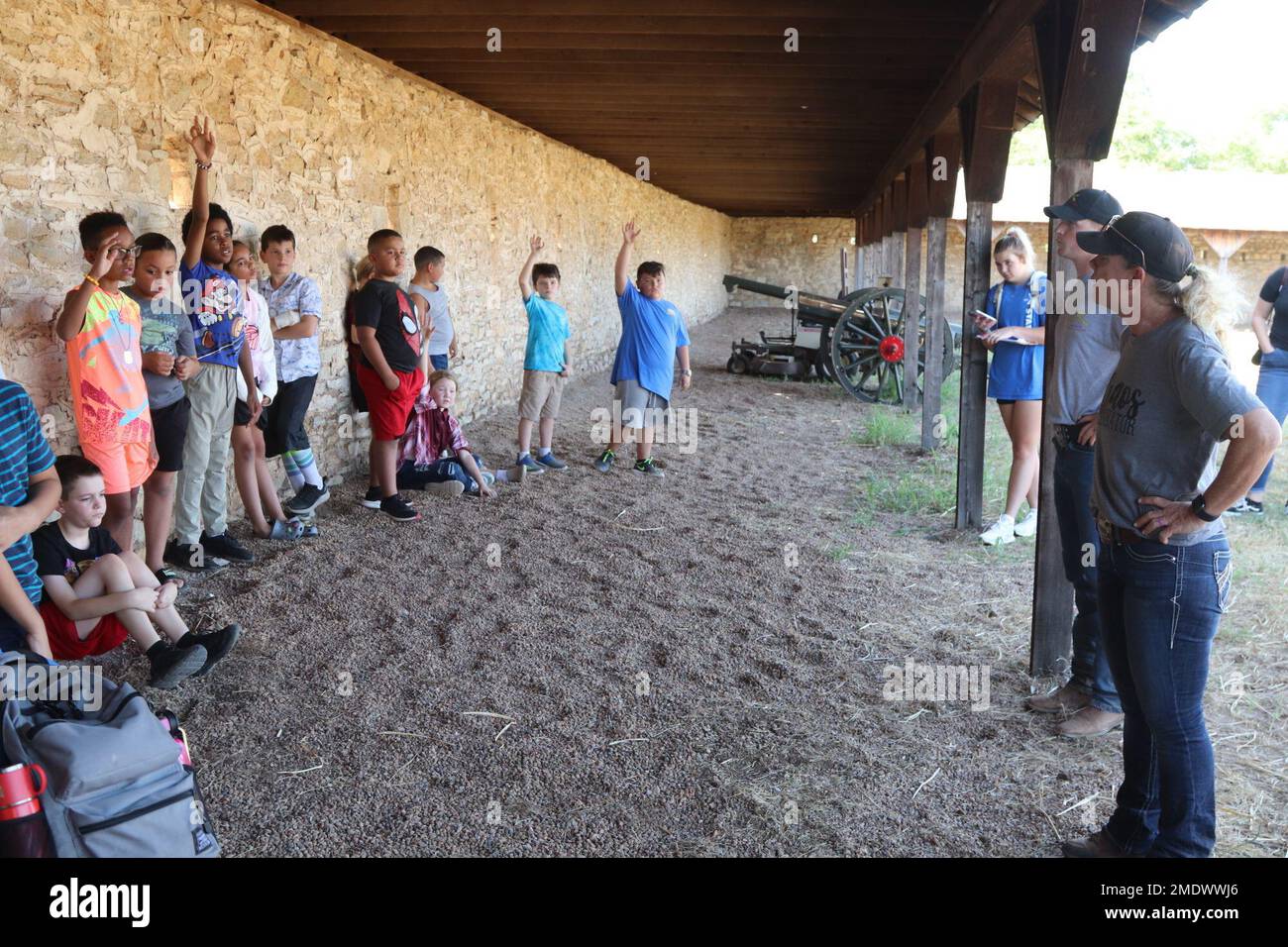 Lara Armstrong, chief, Field Artillery Half Section, asks the children ...