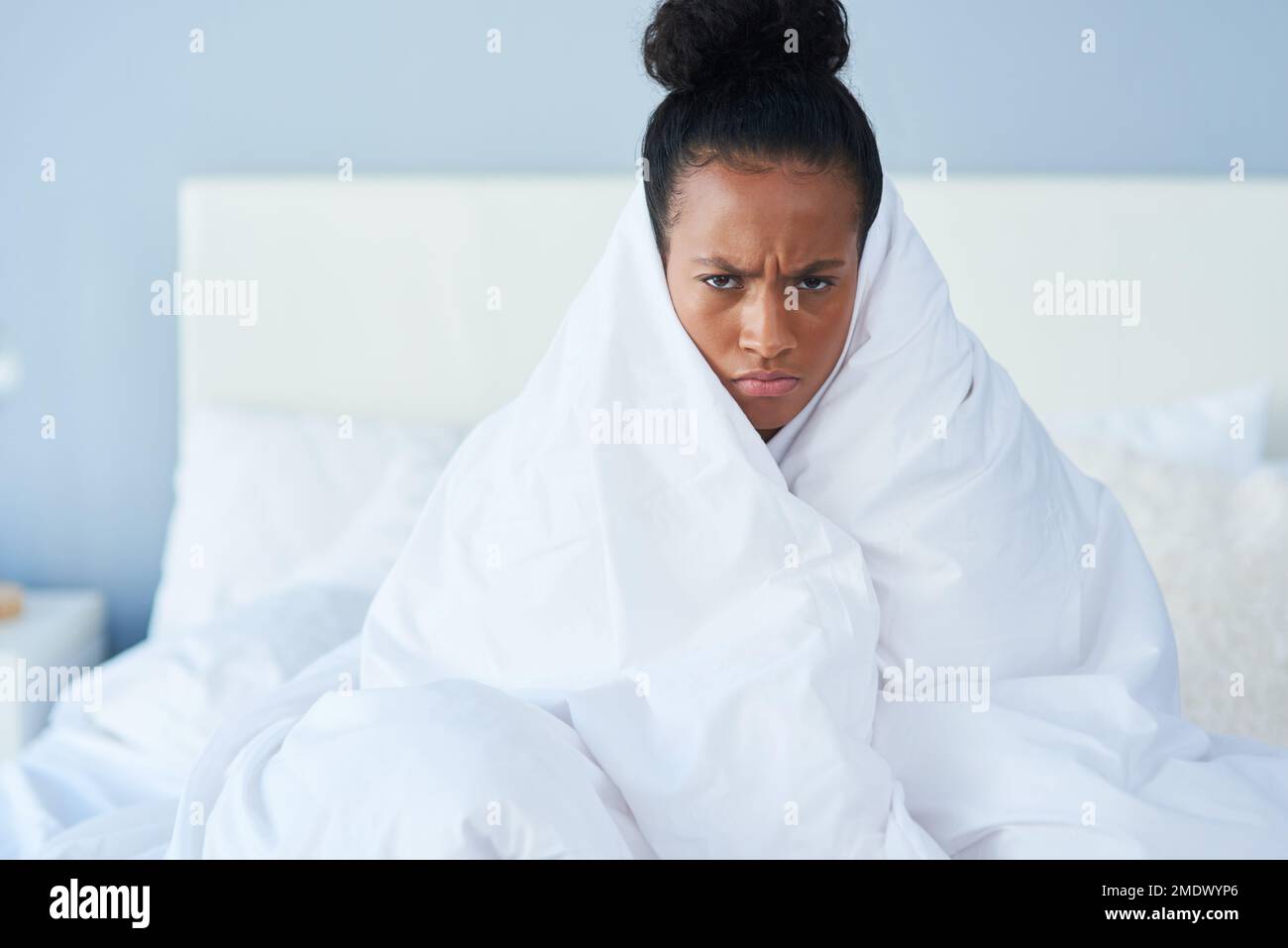 Im not going anywhere today. an attractive young woman wrapped around ...