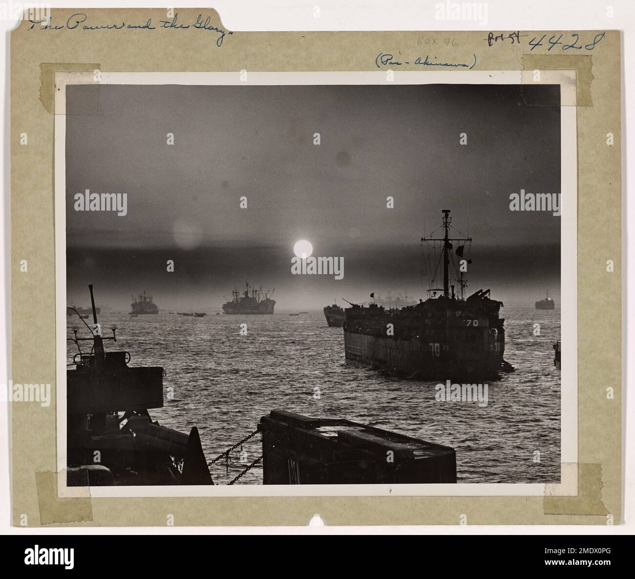 As the sun sets over Okinawa, the American armada—comprised of Coast ...