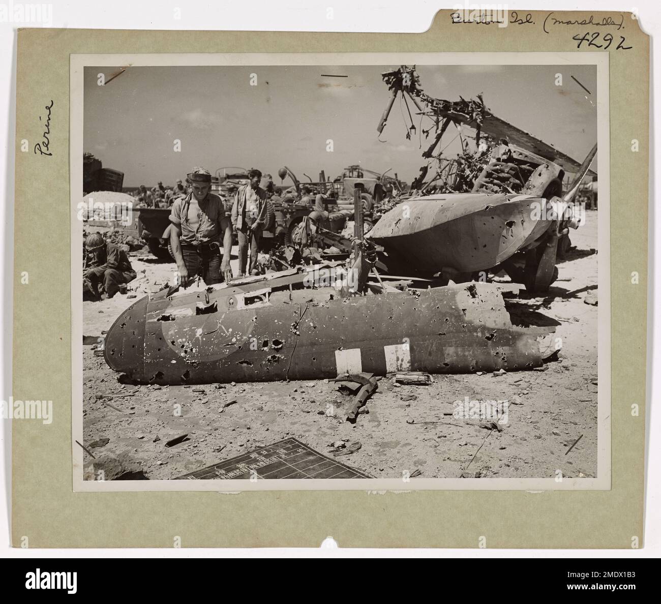 Coast Guardsman William J. Muriekes surveys the battlefield on Burton ...