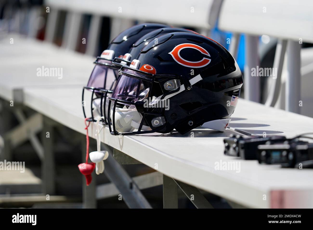 Chicago Bears players helmets sit on the the bench before an NFL ...