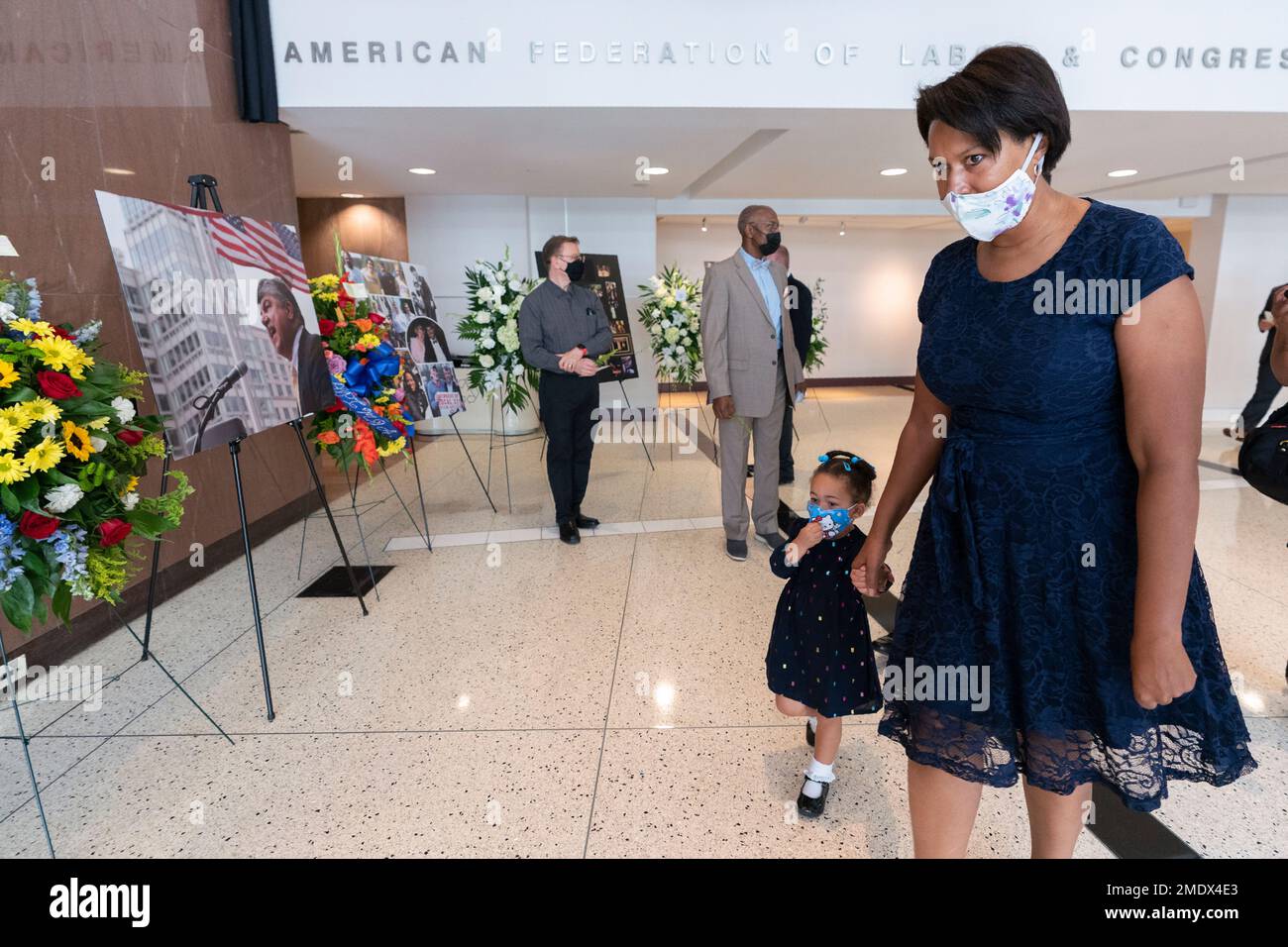 District of Columbia Mayor Muriel Bowser, walks with her daughter ...