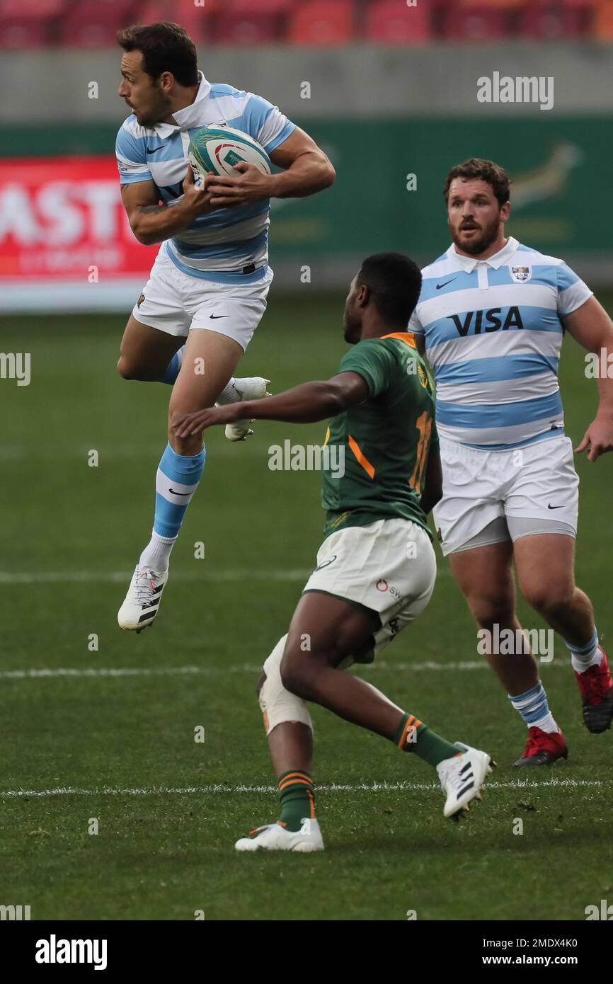 Nicolas Sanchez of Argentina, top, wins the high ball from Aphelele ...