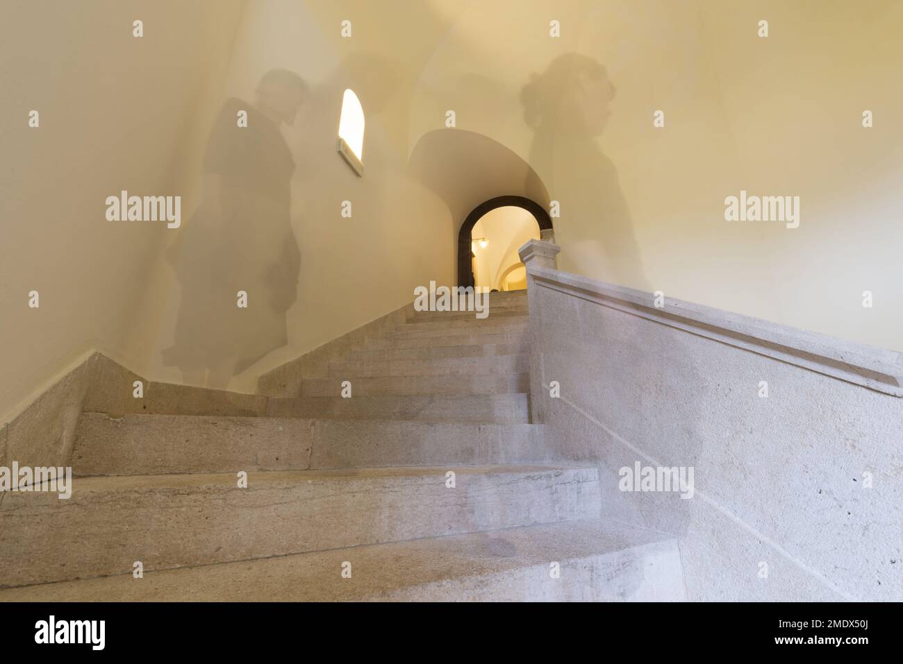 Woman in Long Exposure Walking the Stairs with Windows Stock Photo - Alamy