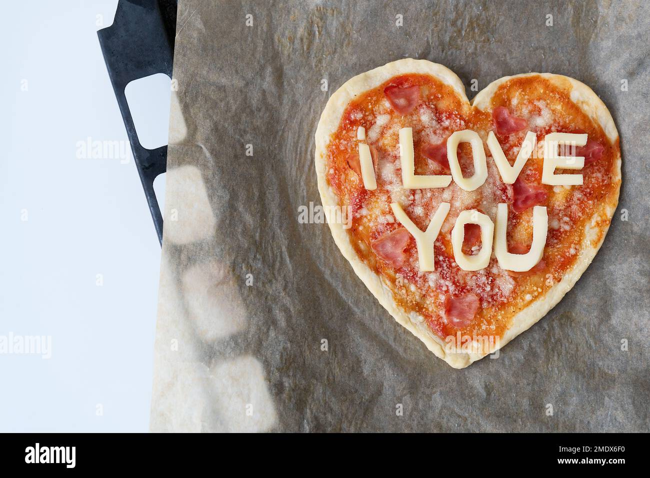 Italian heart shaped pizza with salami, tomato sauce, parmesan, pizza ...